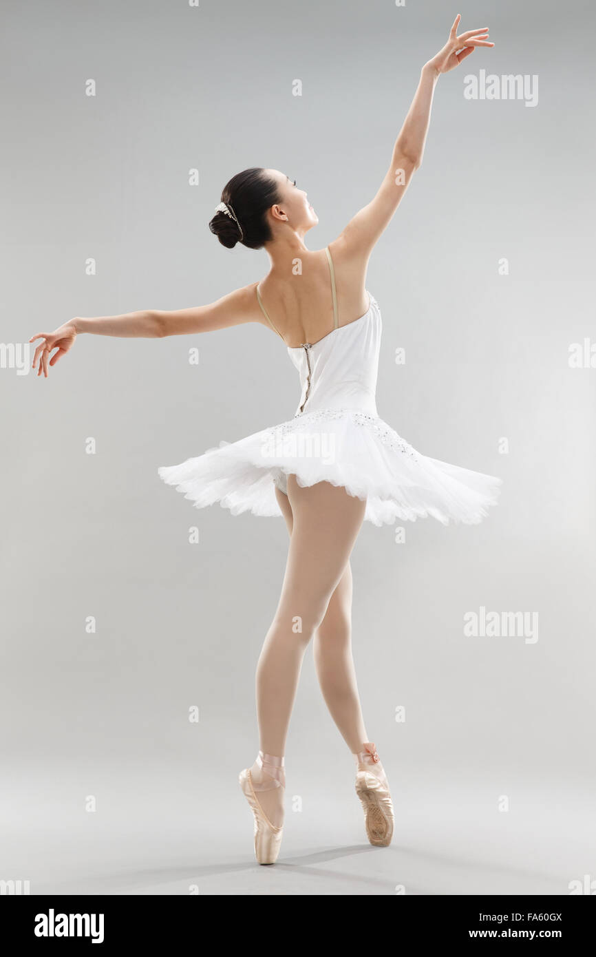 Back view young ballet dancer hi-res stock photography and images - Alamy