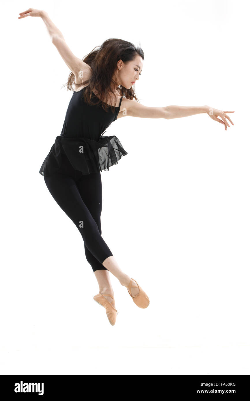 The young woman is dancing Stock Photo - Alamy