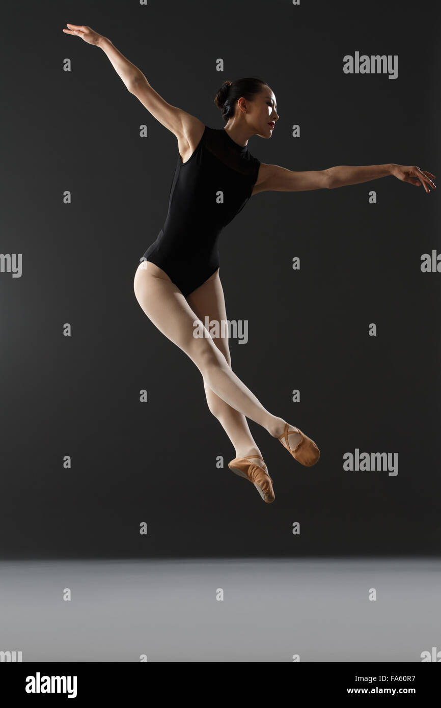 The young woman is dancing Stock Photo - Alamy