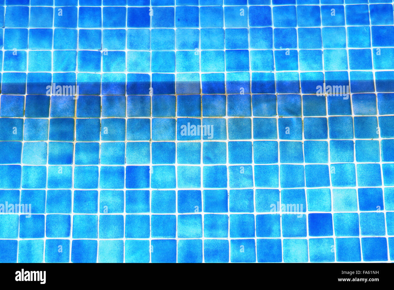 Beautiful water in the pool with blue tiles Stock Photo - Alamy