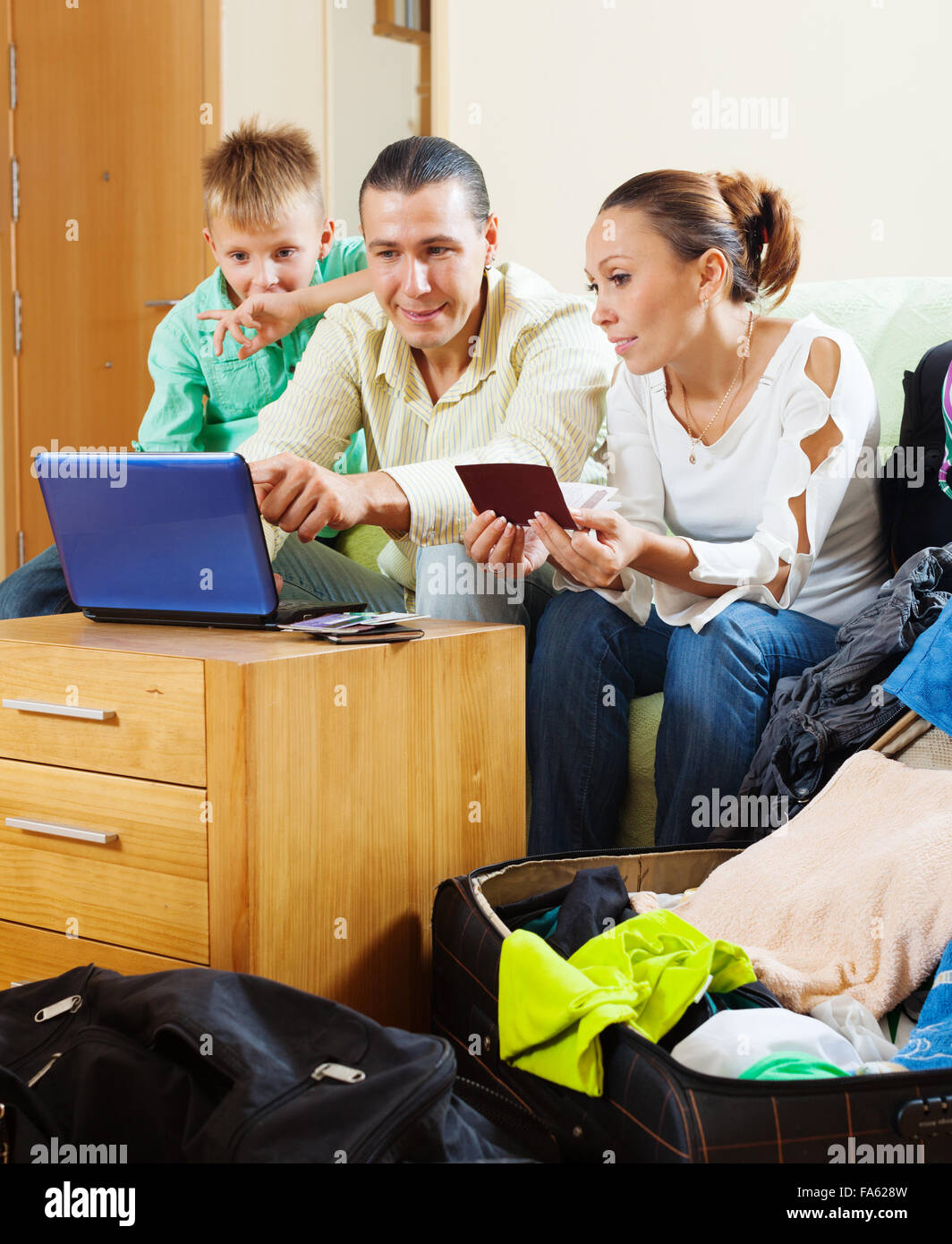 Teen boy packing suitcase hi-res stock photography and images - Alamy
