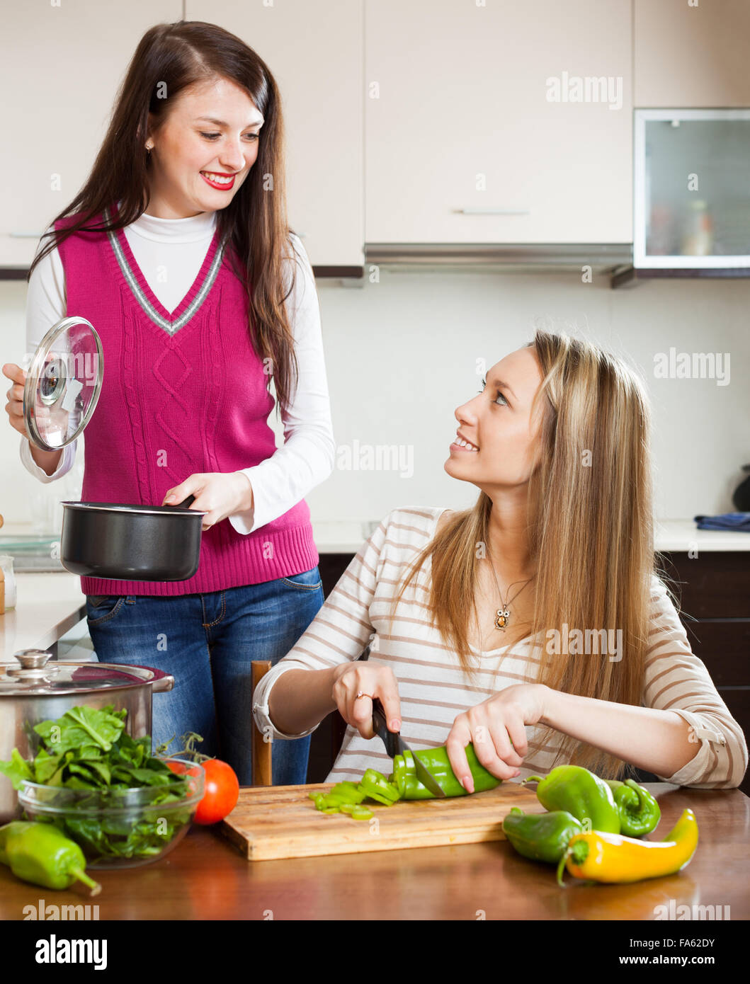 ordinary women cooking food in kitchen at home Stock Photo - Alamy