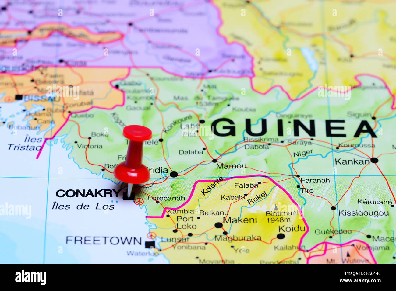 Conakry pinned on a map of Africa Stock Photo - Alamy