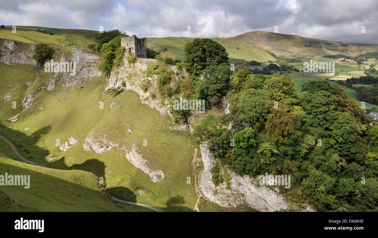 Peveril castle sitting on a limestone crag above Cave Dale in Castleton ...