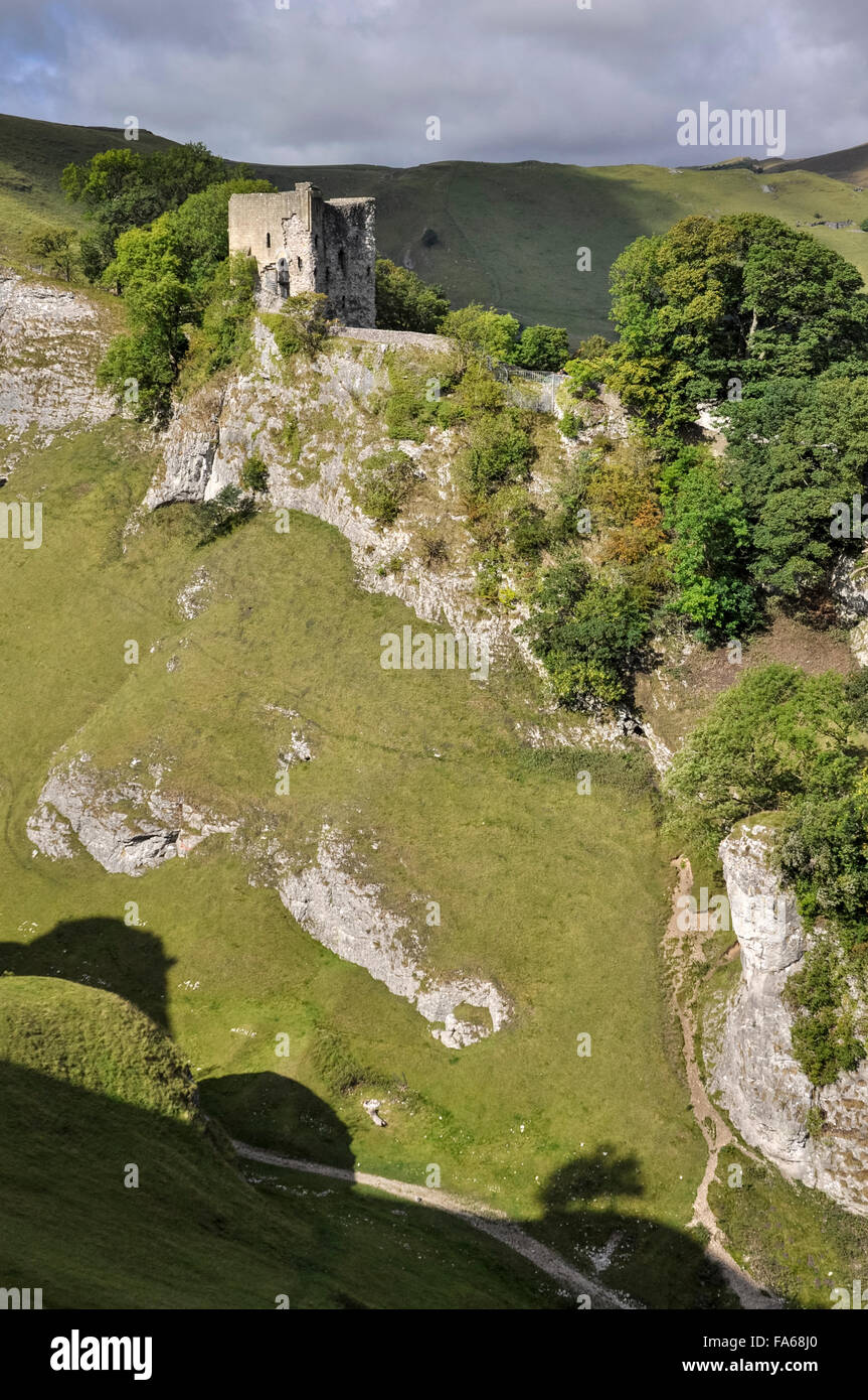 Peveril castle sitting on a limestone crag above Cave Dale in Castleton ...