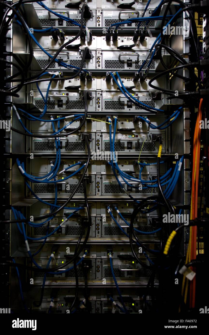 close up shot of server and cables in a server room Stock Photo - Alamy