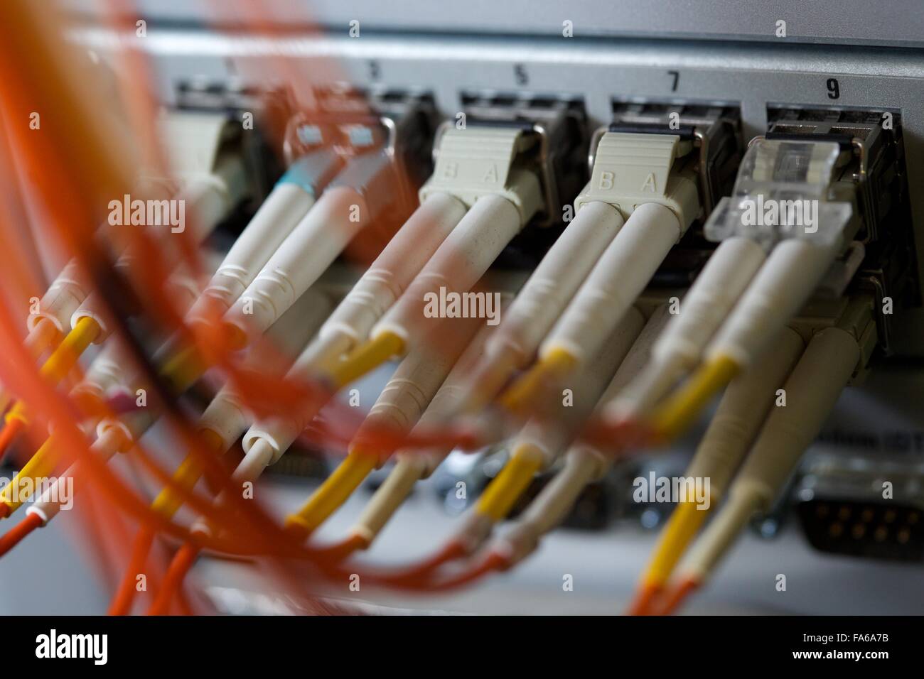 close up shot of server and cables in a server room Stock Photo - Alamy
