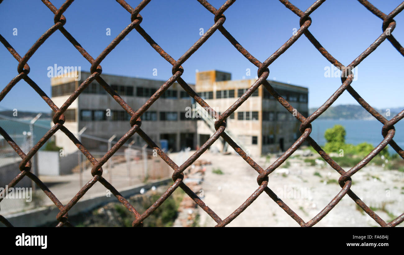 Alcatraz prison seen through chainlink fence, San Francisco, California ...