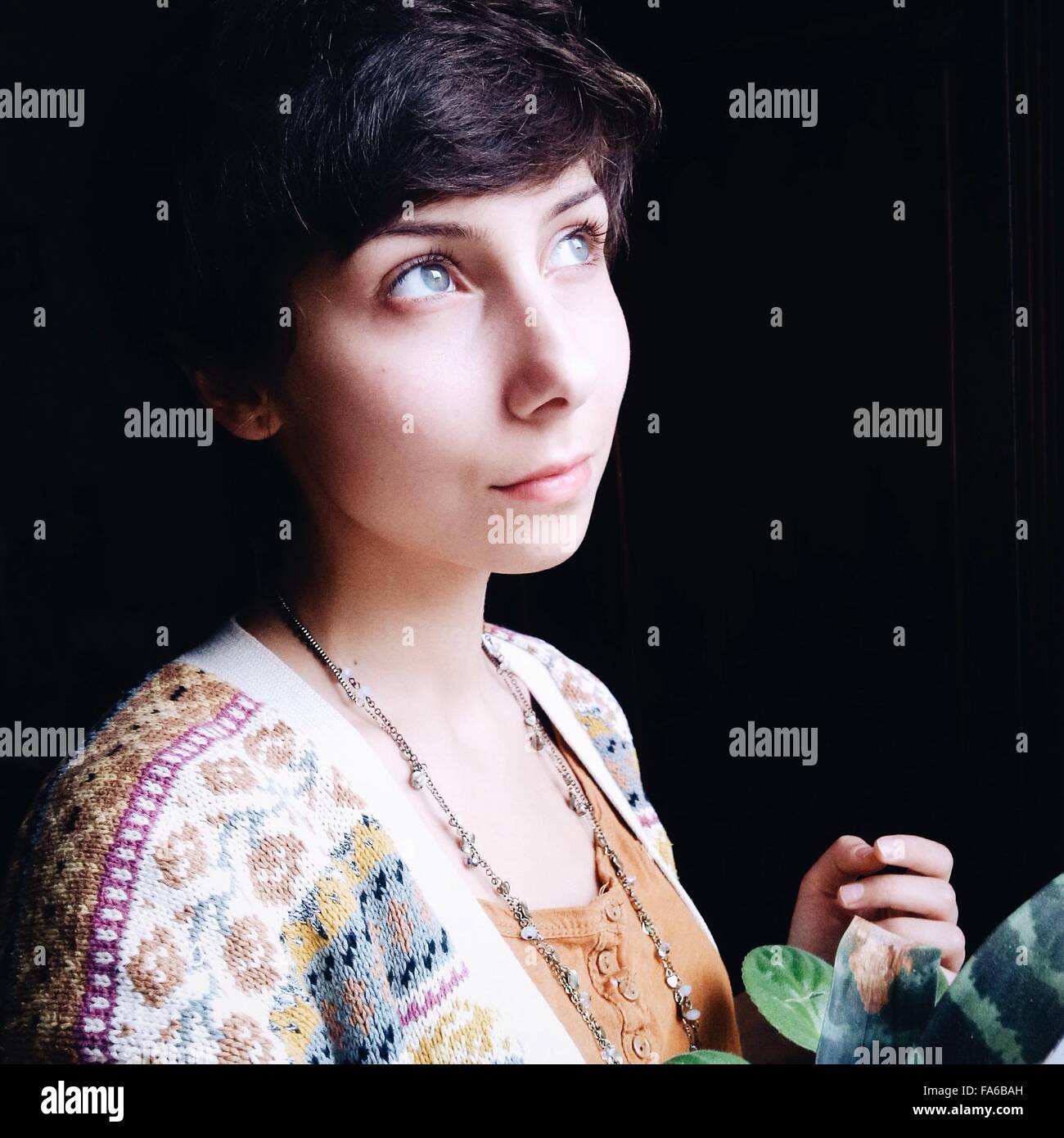 Portrait of a woman looking up Stock Photo - Alamy