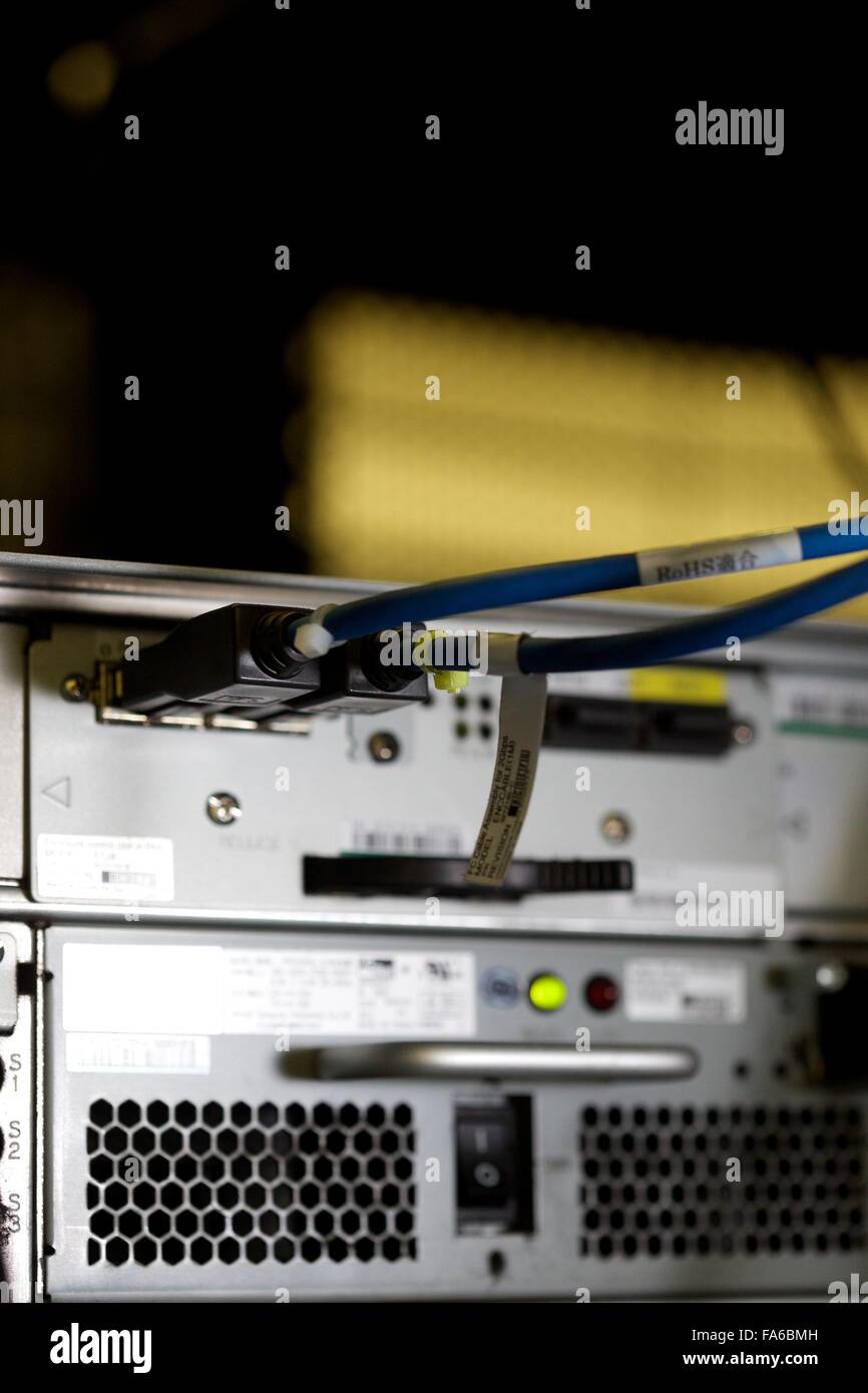 close up shot of server and cables in a server room Stock Photo - Alamy