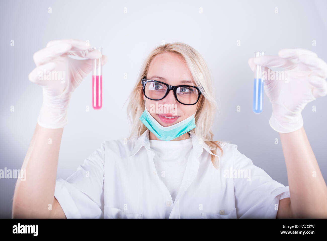 Scientist holding test tubes Stock Photo - Alamy