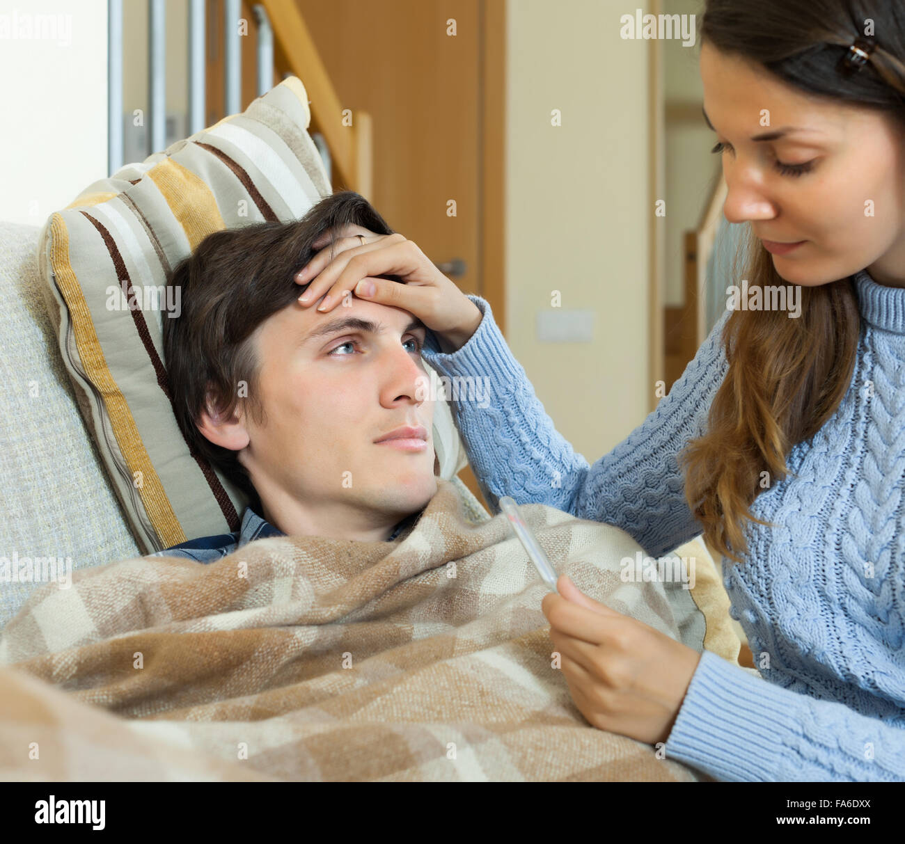 Woman Caring Sick Guy Home High Resolution Stock Photography and Images ...