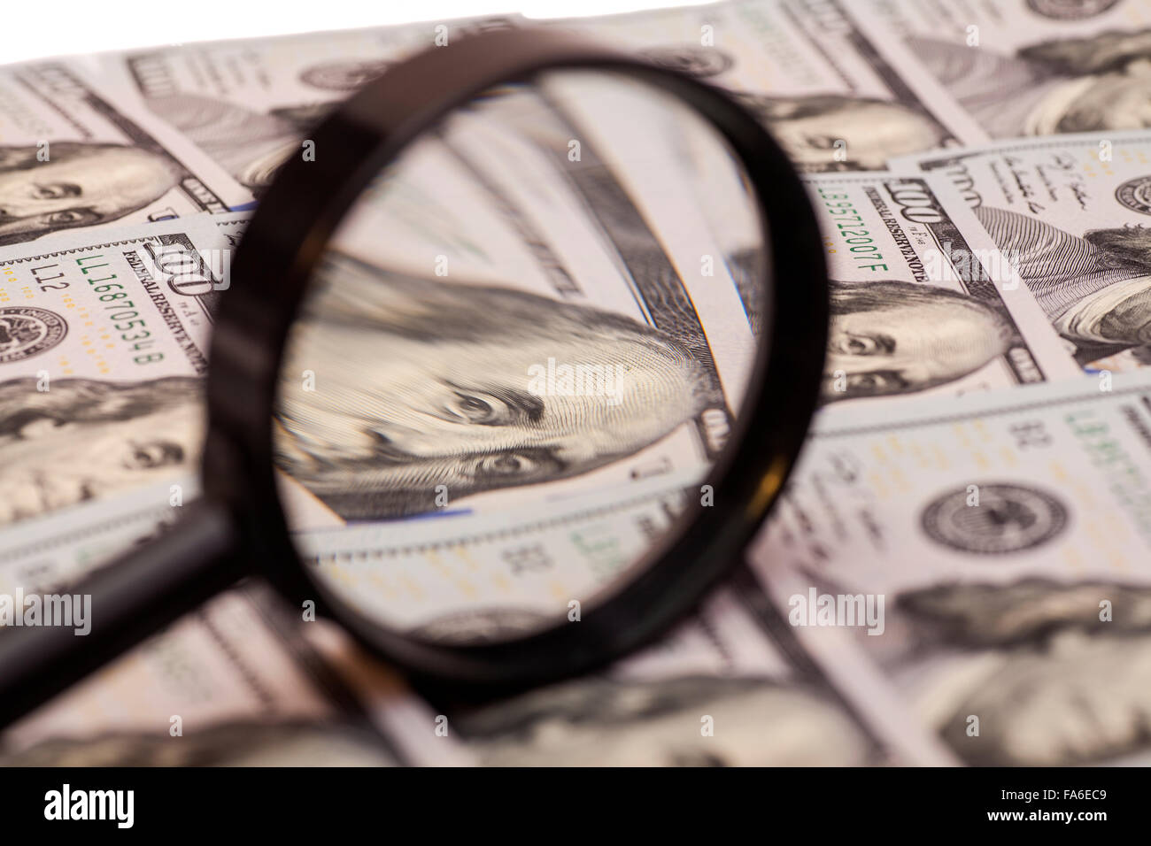 Hundred dollar banknote under magnifying glass Stock Photo - Alamy