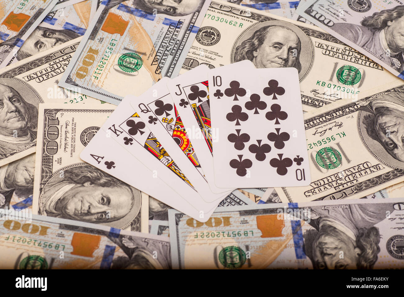 Playing cards and dollars Stock Photo - Alamy