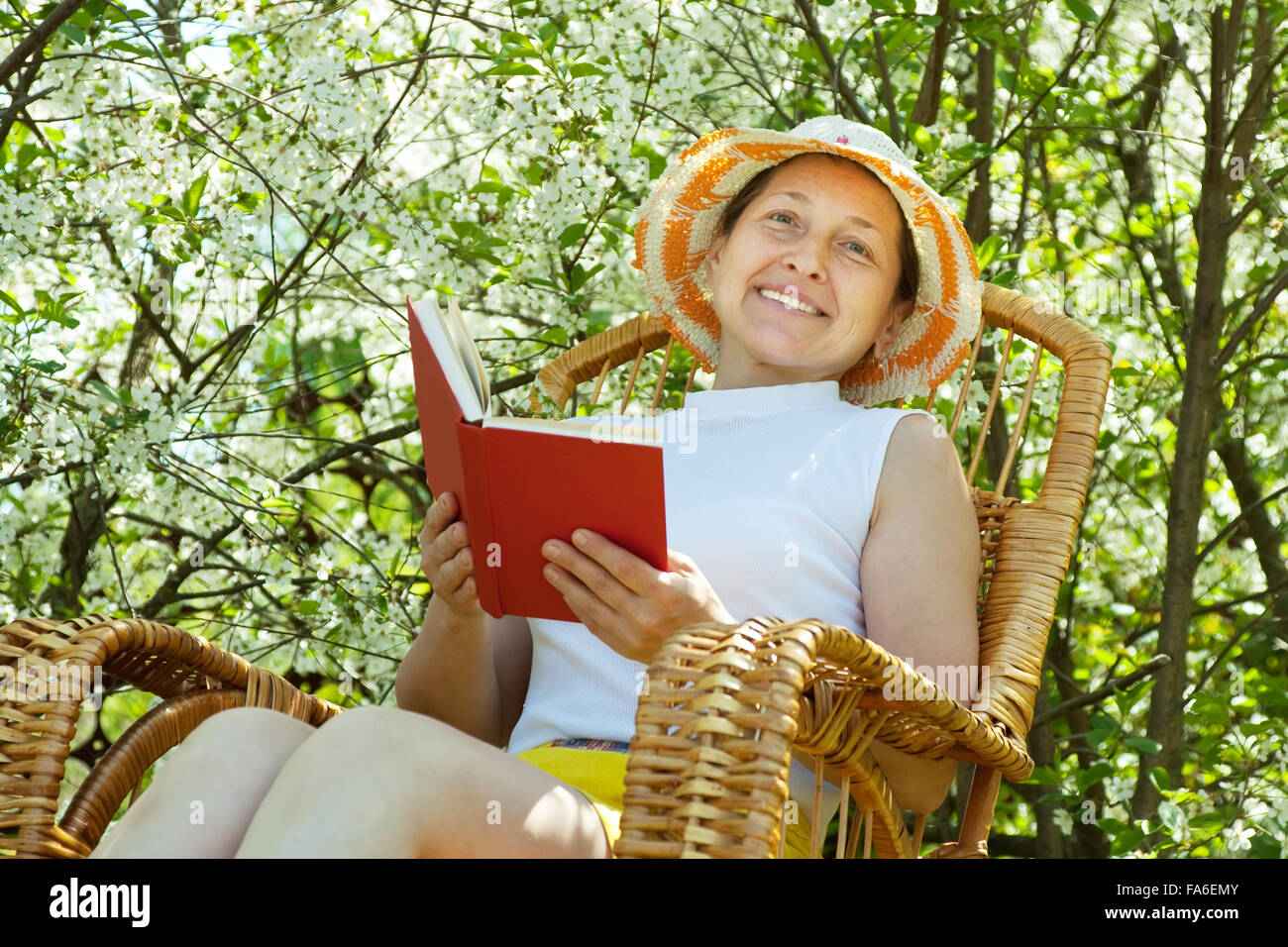 Woman in rocking chair hi-res stock photography and images - Alamy