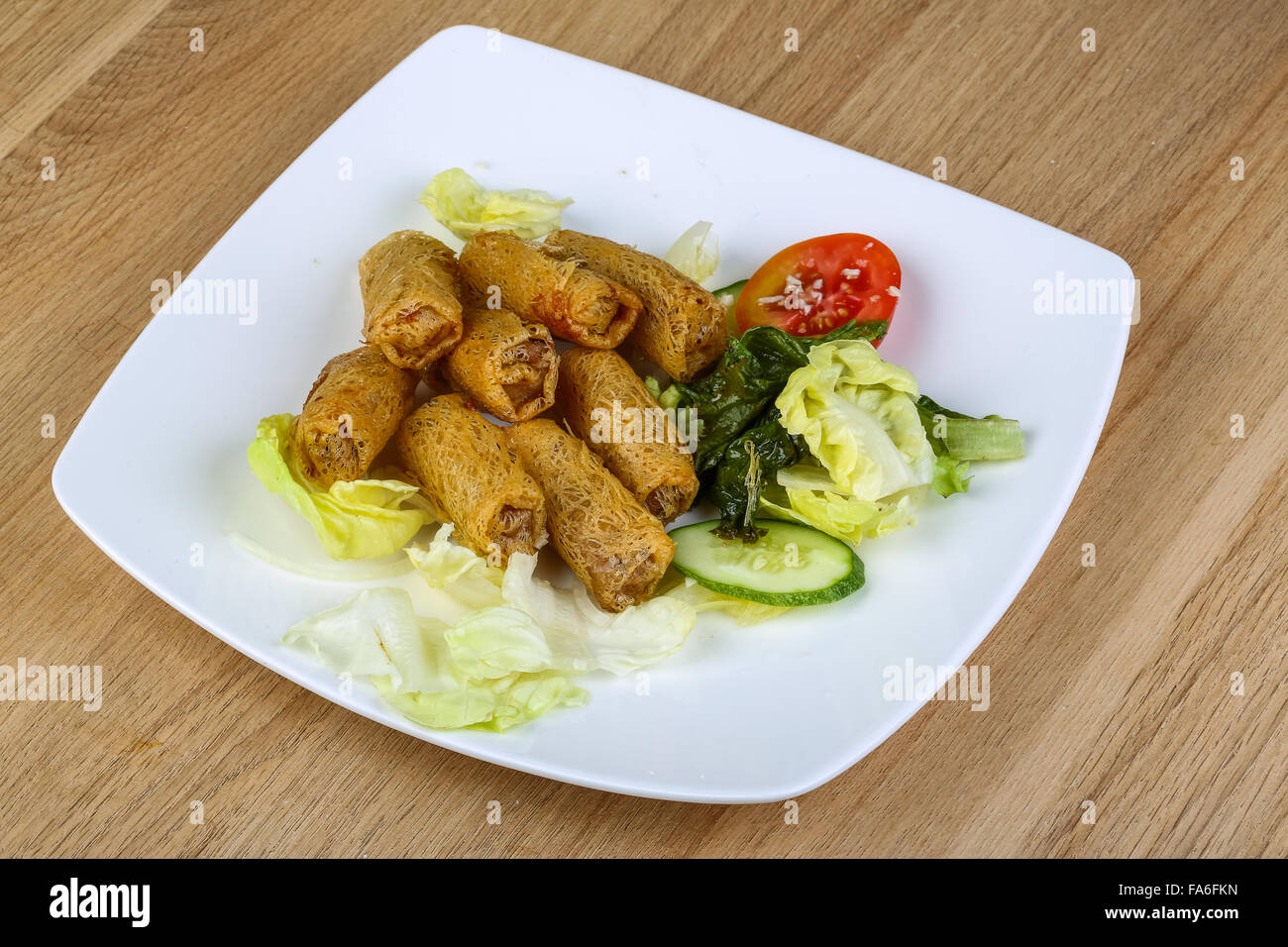 Asian traditional spring rolls on the wood background Stock Photo - Alamy