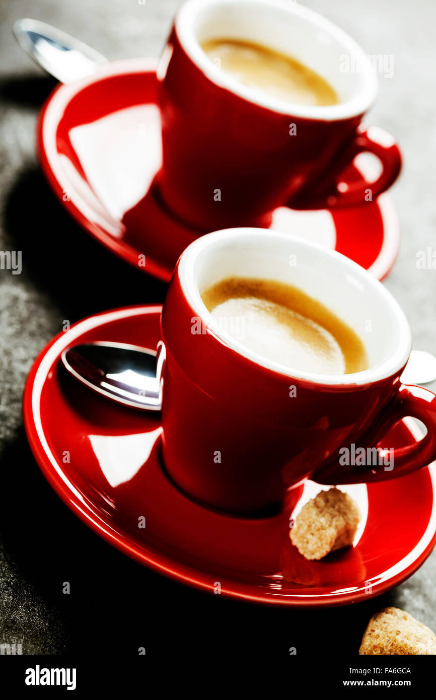 Coffee Espresso. Red Cups Of Coffee on dark background Stock Photo - Alamy