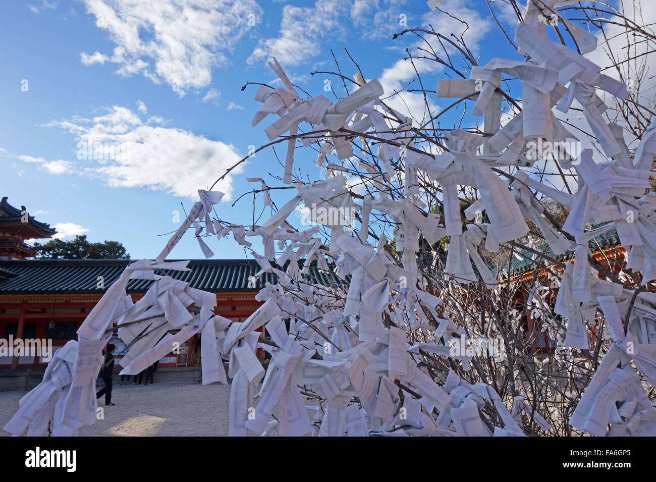 Prayers written on paper and tied to a tree at Heian-jingu Shinto ...