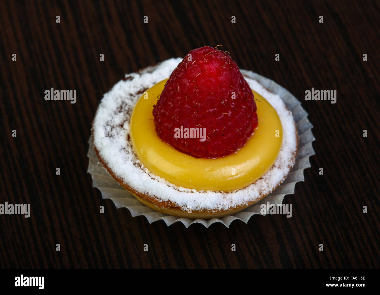 Sweet Pastry with berries on the wood background Stock Photo - Alamy