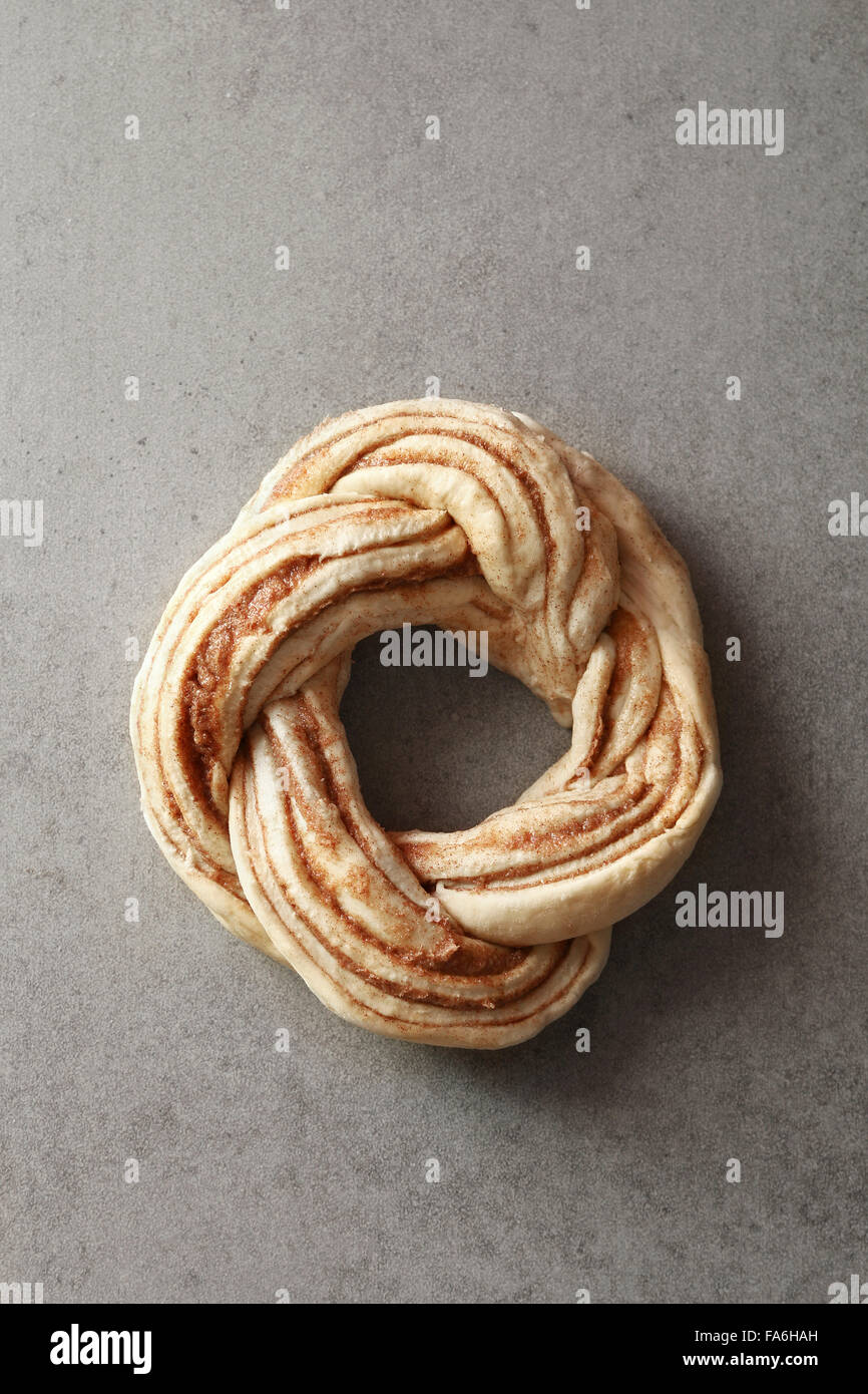 Braided cinnamon brioche wreath dough Stock Photo - Alamy