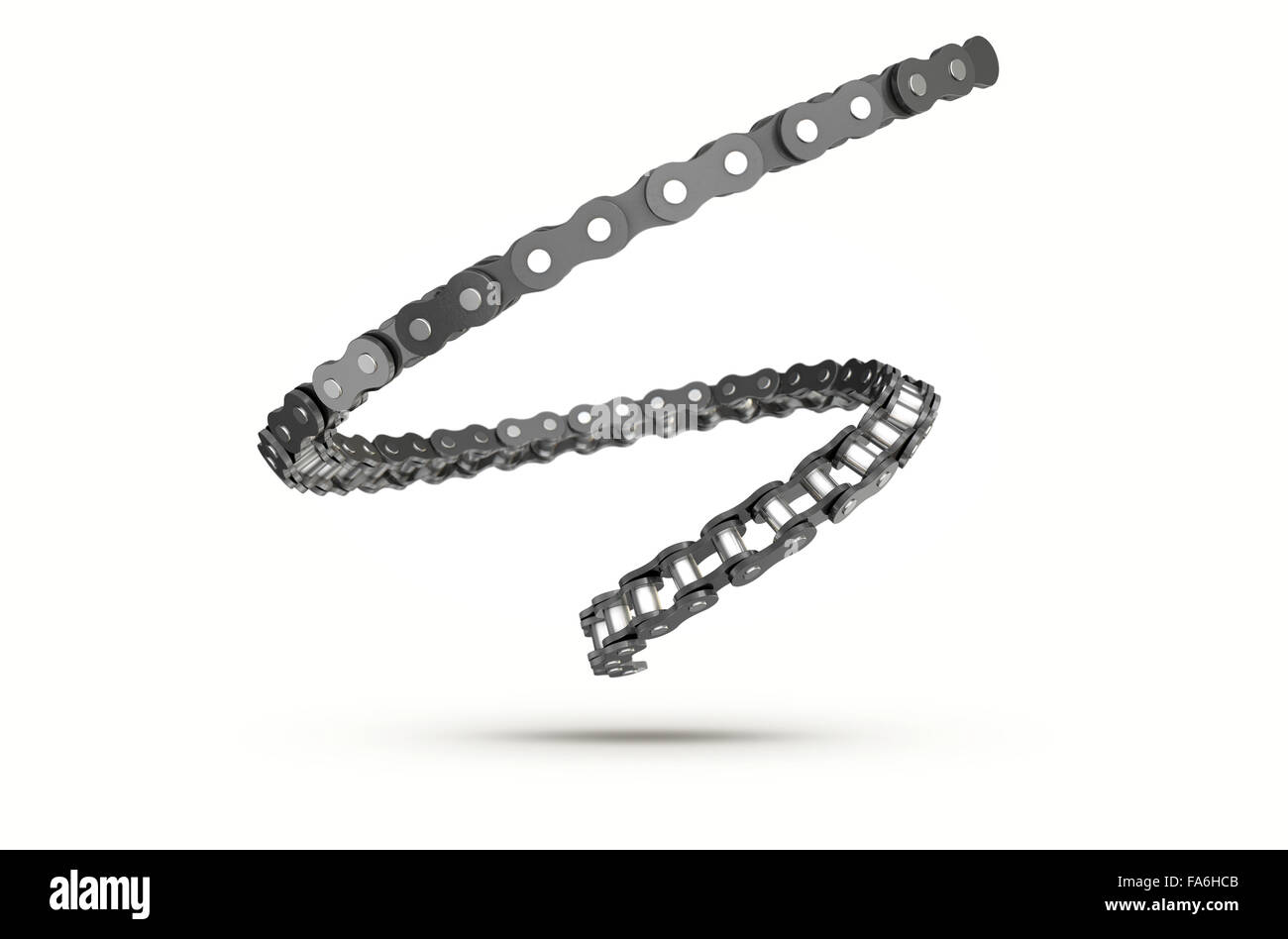 A section of a metal bicycle chain in the shape of a spiral on an ...