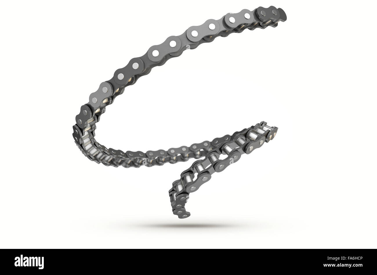 A section of a metal bicycle chain in the shape of a spiral on an ...