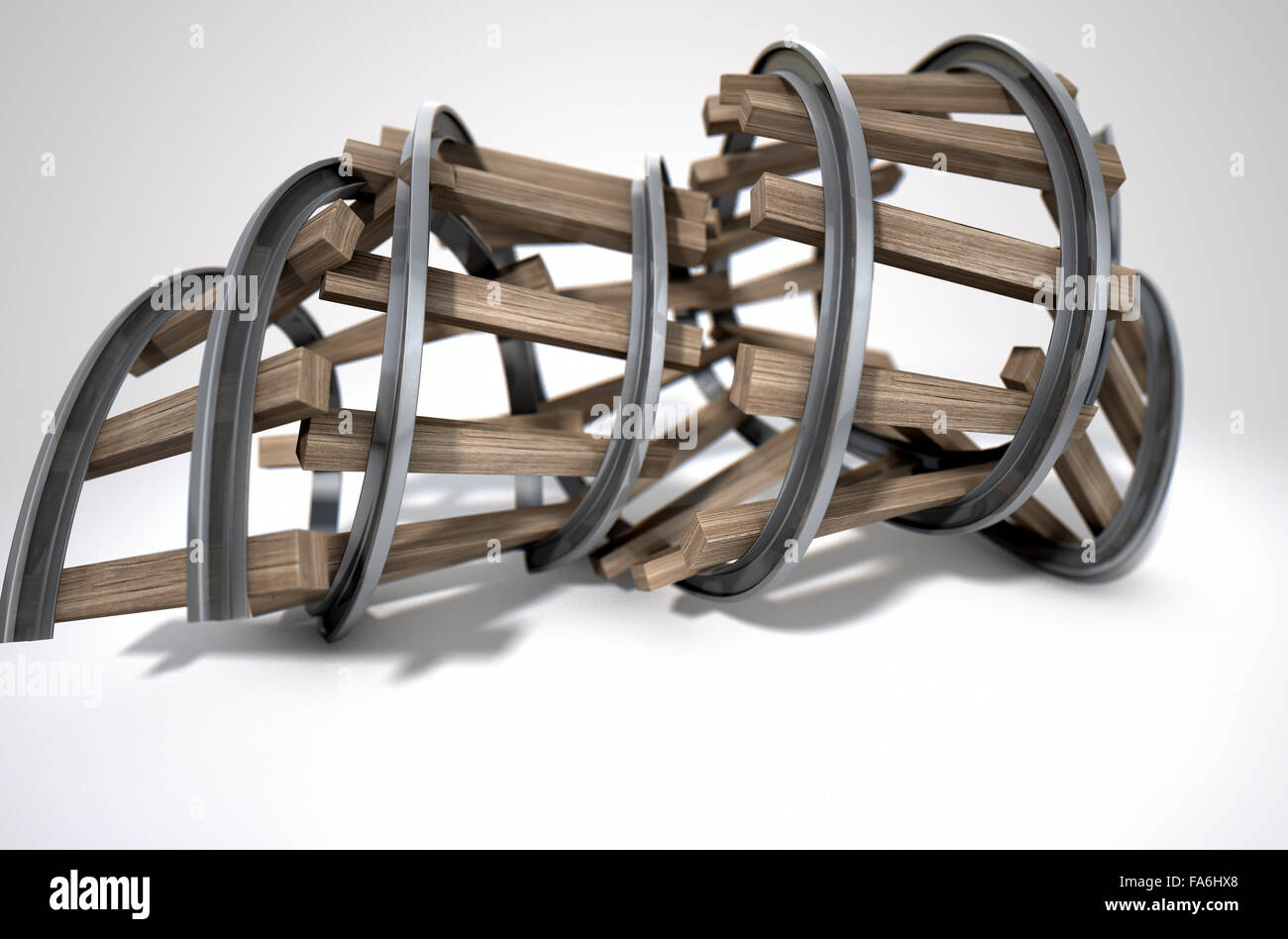 A concept showing a short piece of rail way track peeled into a spiral ...