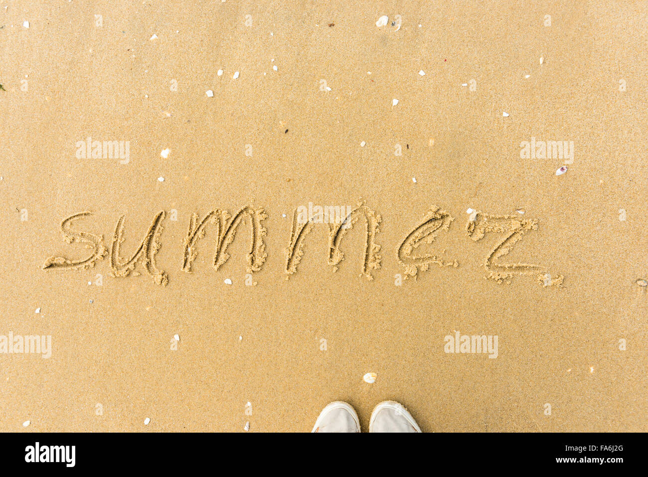 Summer written on the beach. sand background Stock Photo - Alamy