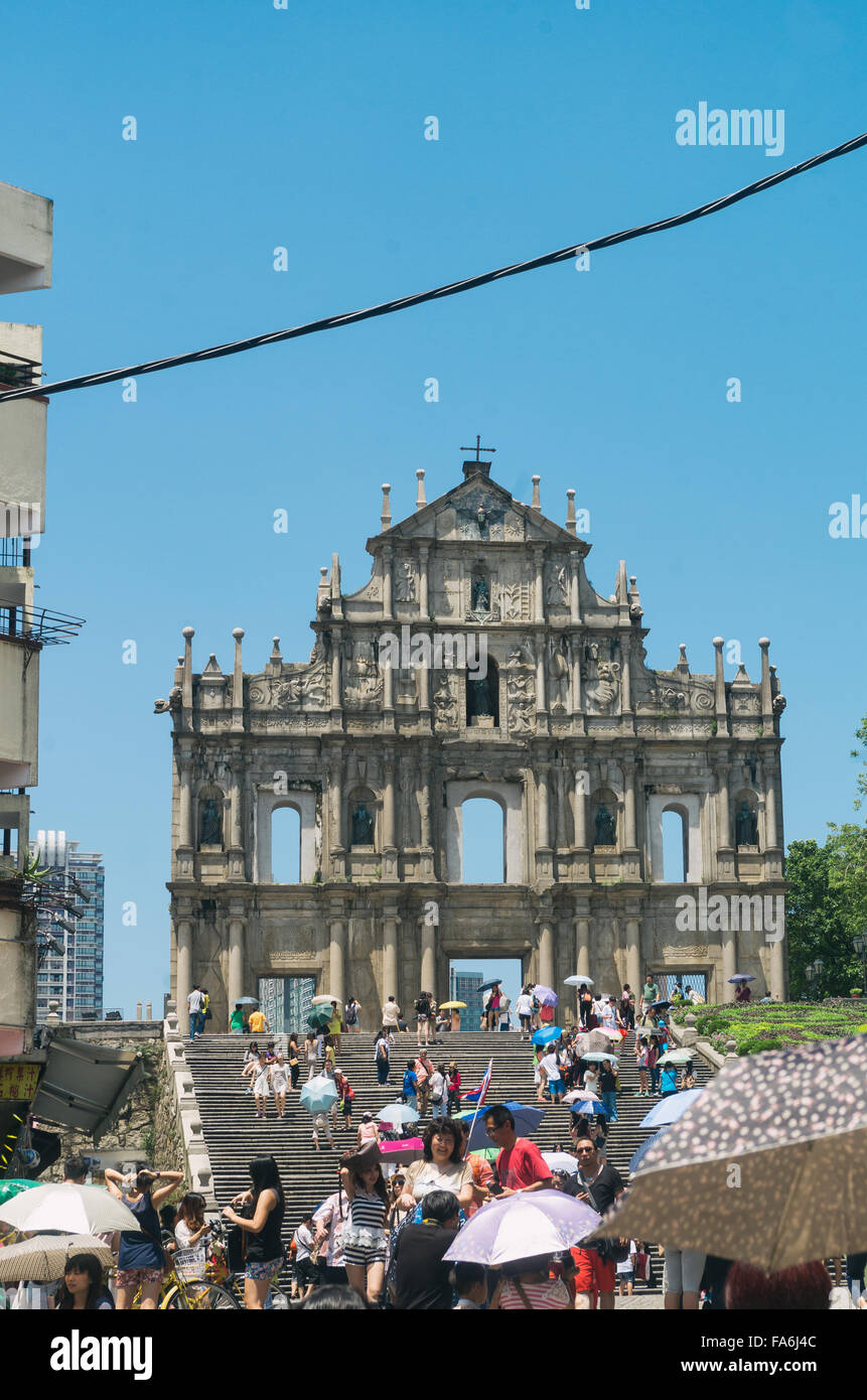 Macau, China - Circa 2013 - Tourists crowd in Ruins of St. Paul's, the ...