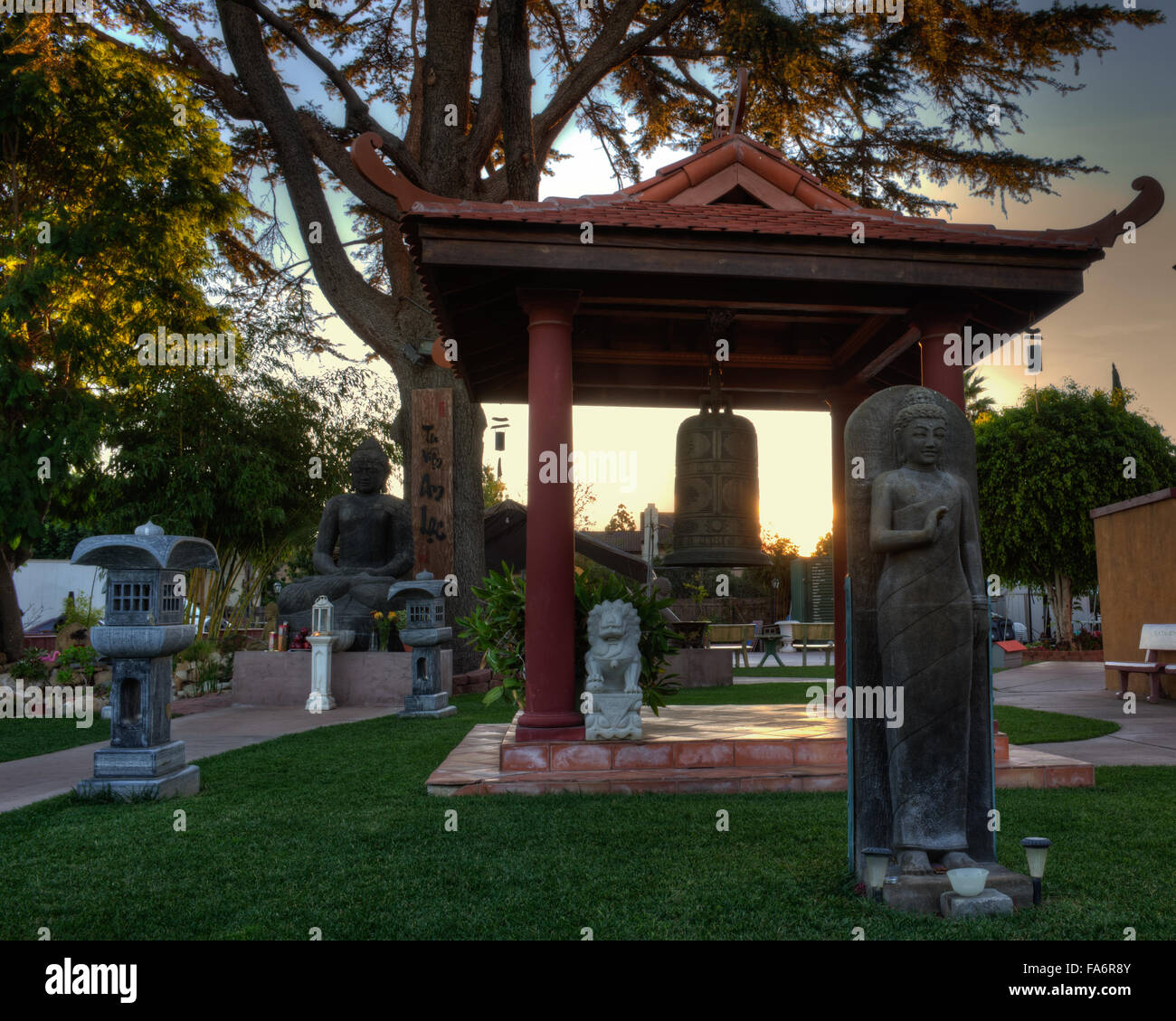 Buddhist statues in the temple garden Stock Photo - Alamy