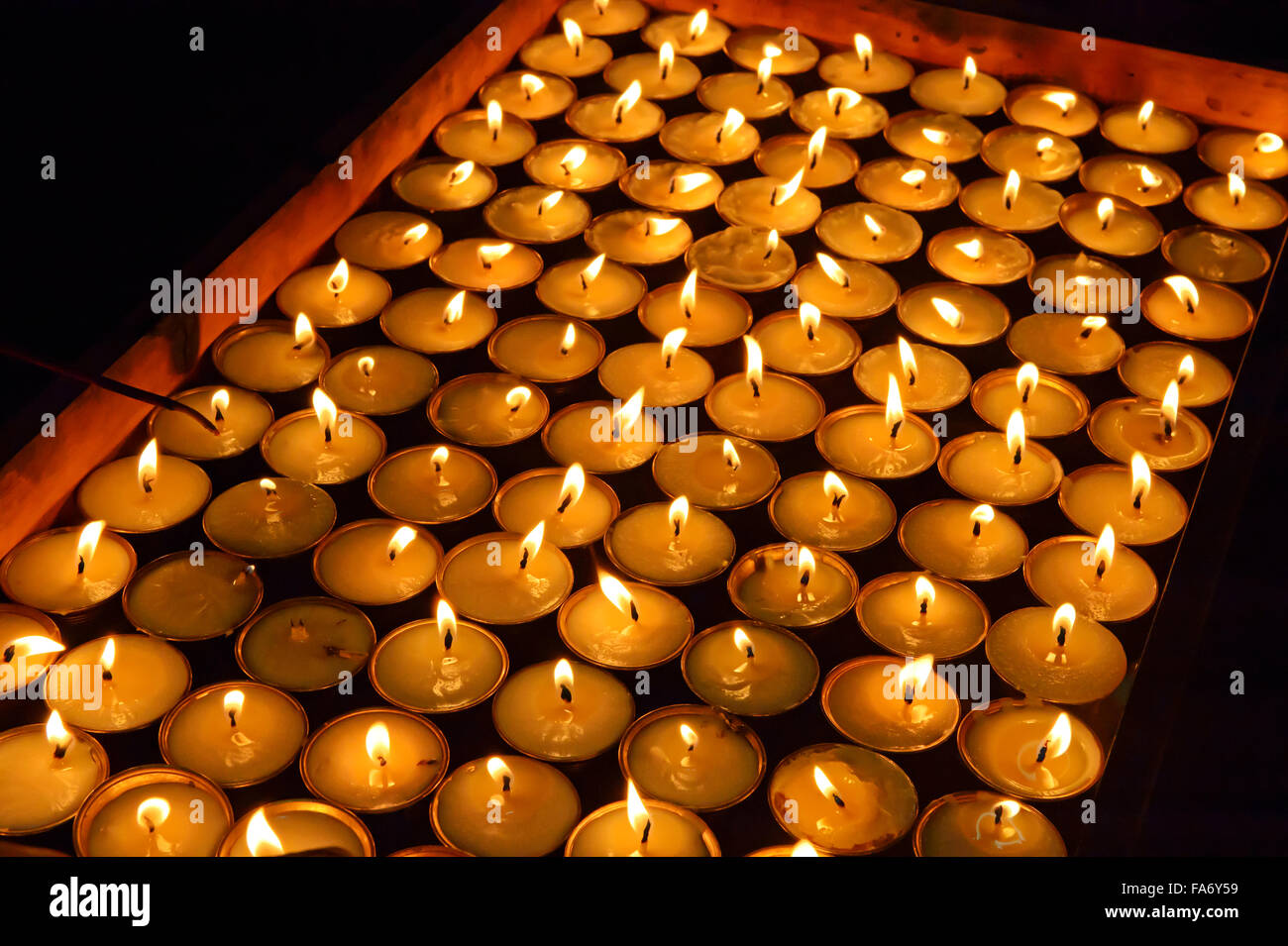 Butter lamps in a Buddhist monastery, Thimphu, Bhutan Stock Photo - Alamy