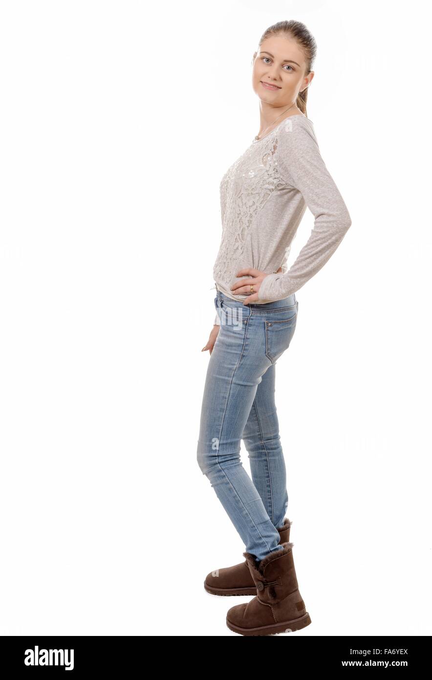 a pretty young woman standing on white background Stock Photo - Alamy