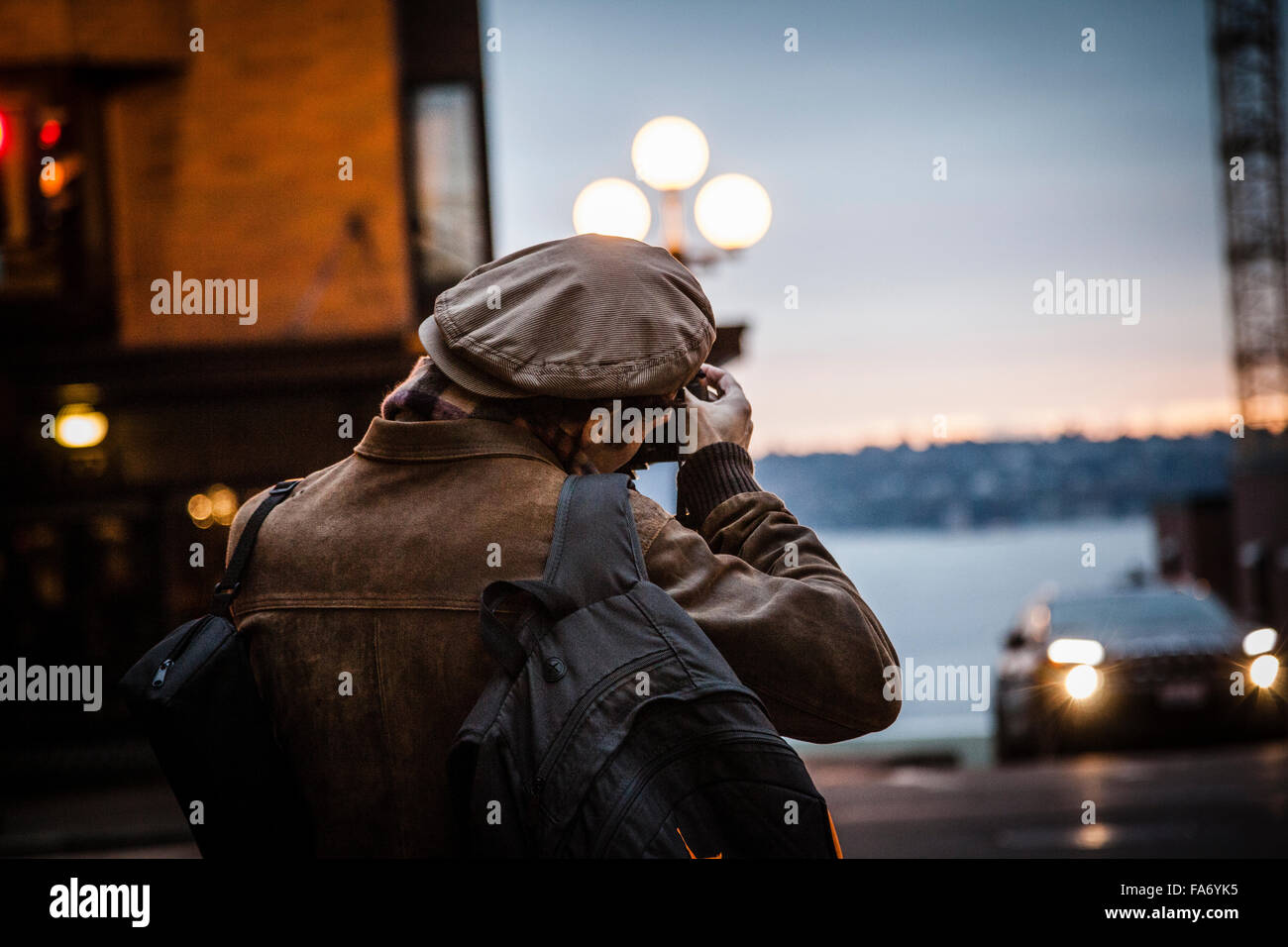 Professional photographer taking a picture Stock Photo - Alamy
