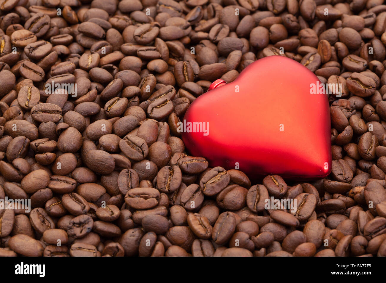 Coffee beans and red heart Stock Photo - Alamy