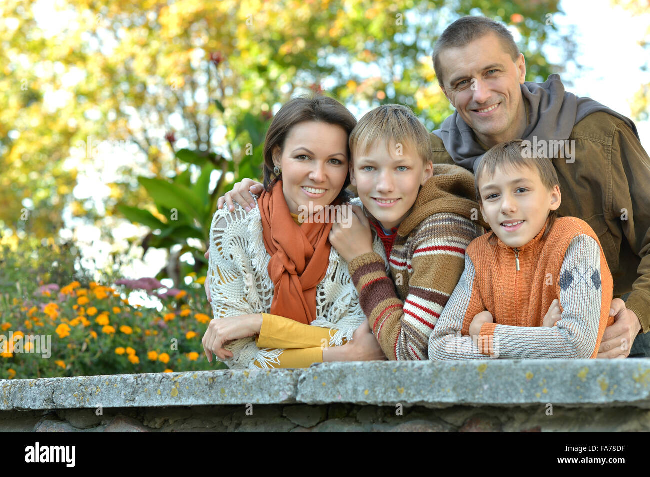 Portrait of family relaxing Stock Photo - Alamy