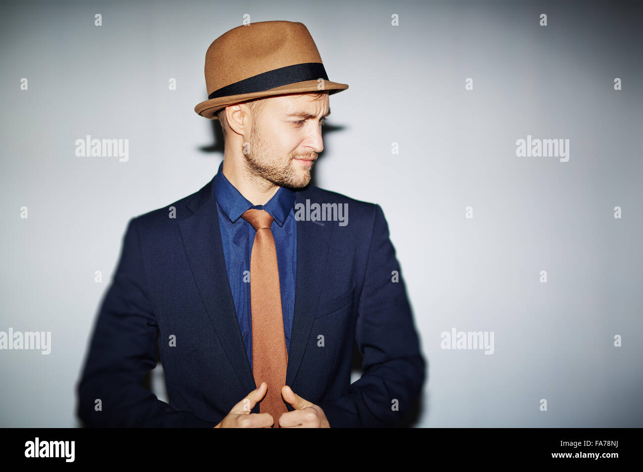 Stylish young man in formal-wear Stock Photo - Alamy
