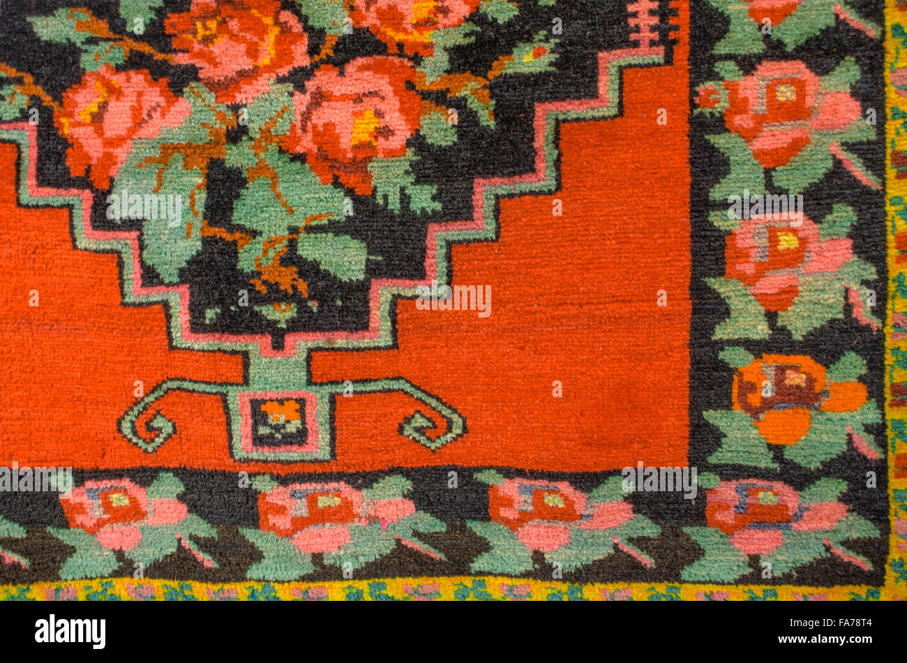 Woolen carpet with bright floral pattern Stock Photo - Alamy