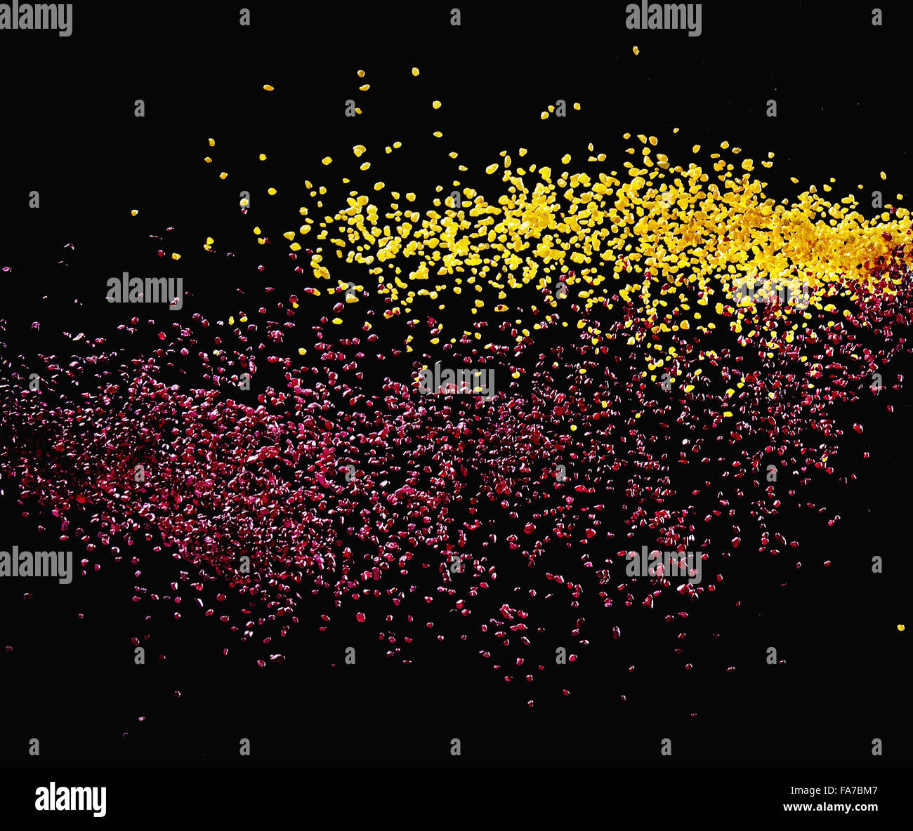 Colorful tiny particles over a dark theme background Stock Photo - Alamy