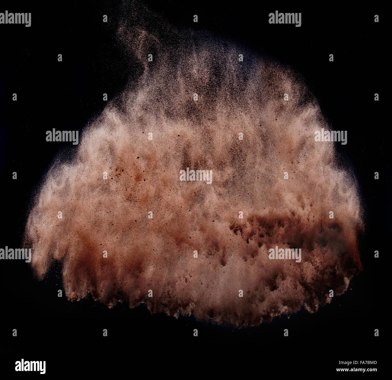 Brown powder tornado over dark theme background Stock Photo - Alamy