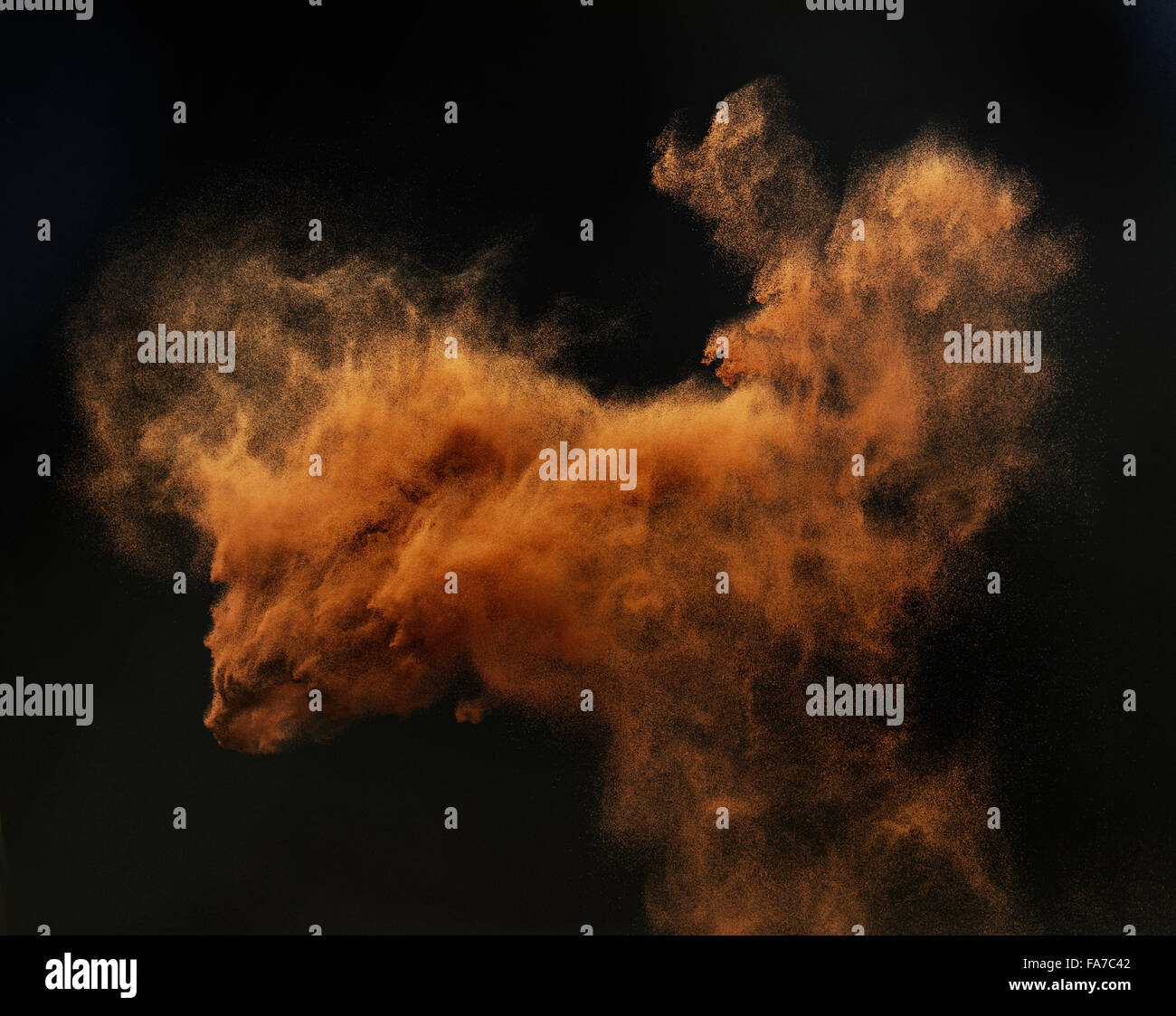 Dark background with spray of sand hi-res stock photography and images ...