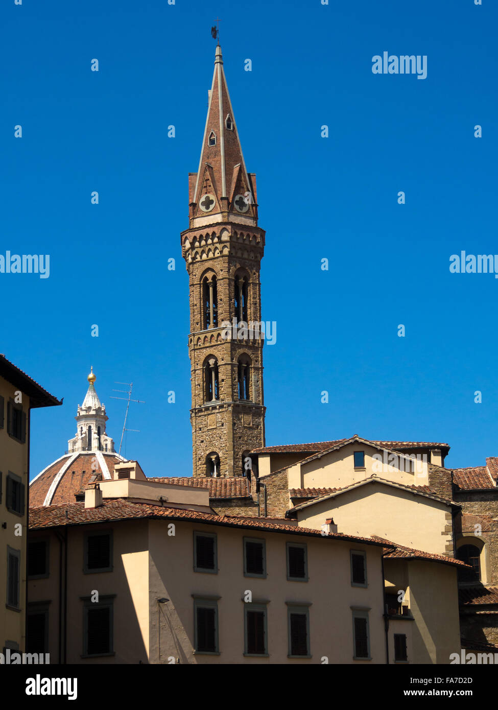 FLORENCE, ITALY - AUGUST 06, 2015: Tower of the Badìa Fiorentina Abbey ...