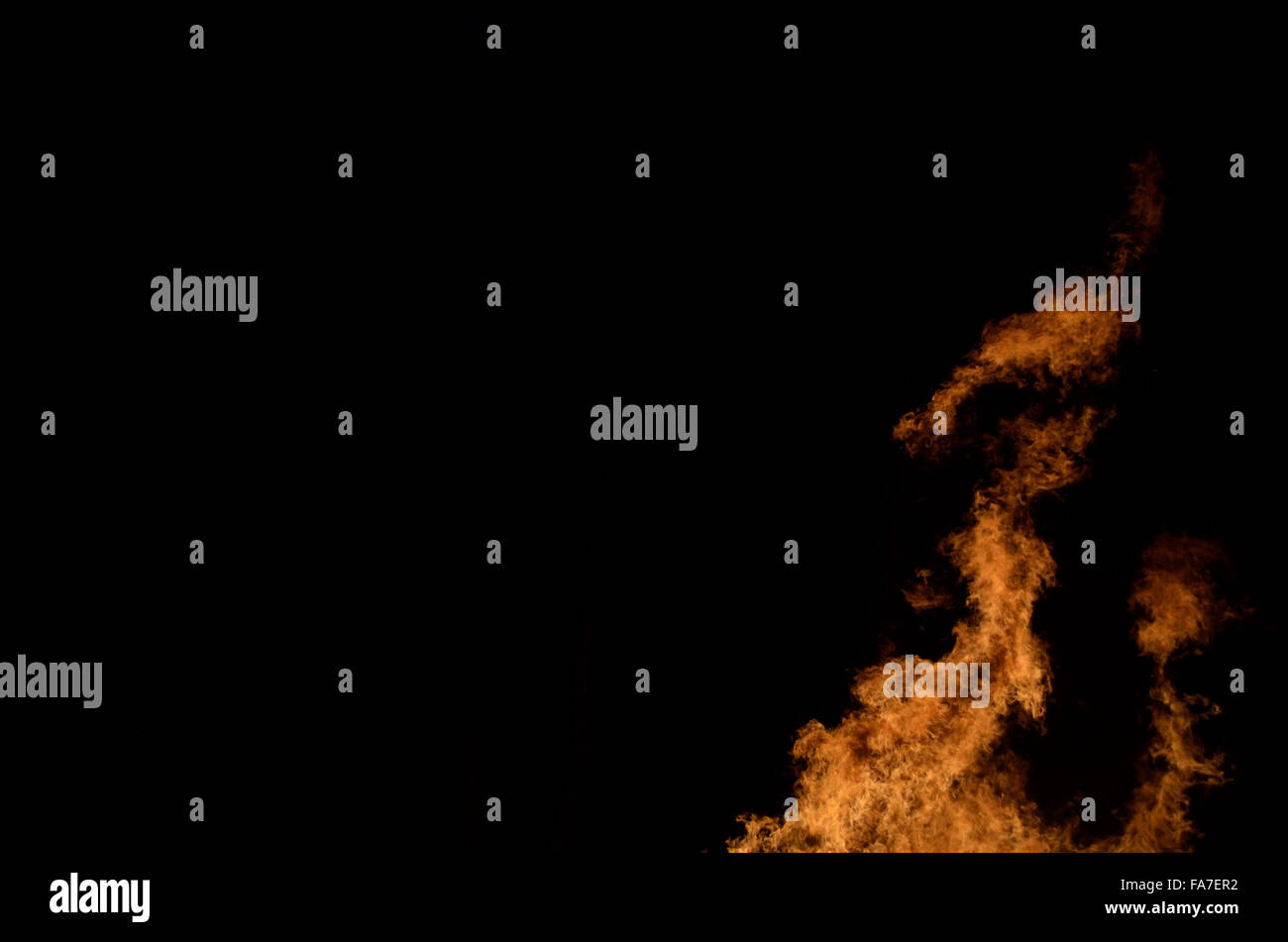 beautiful hot burning tall flames from bonfire on dark winter ...