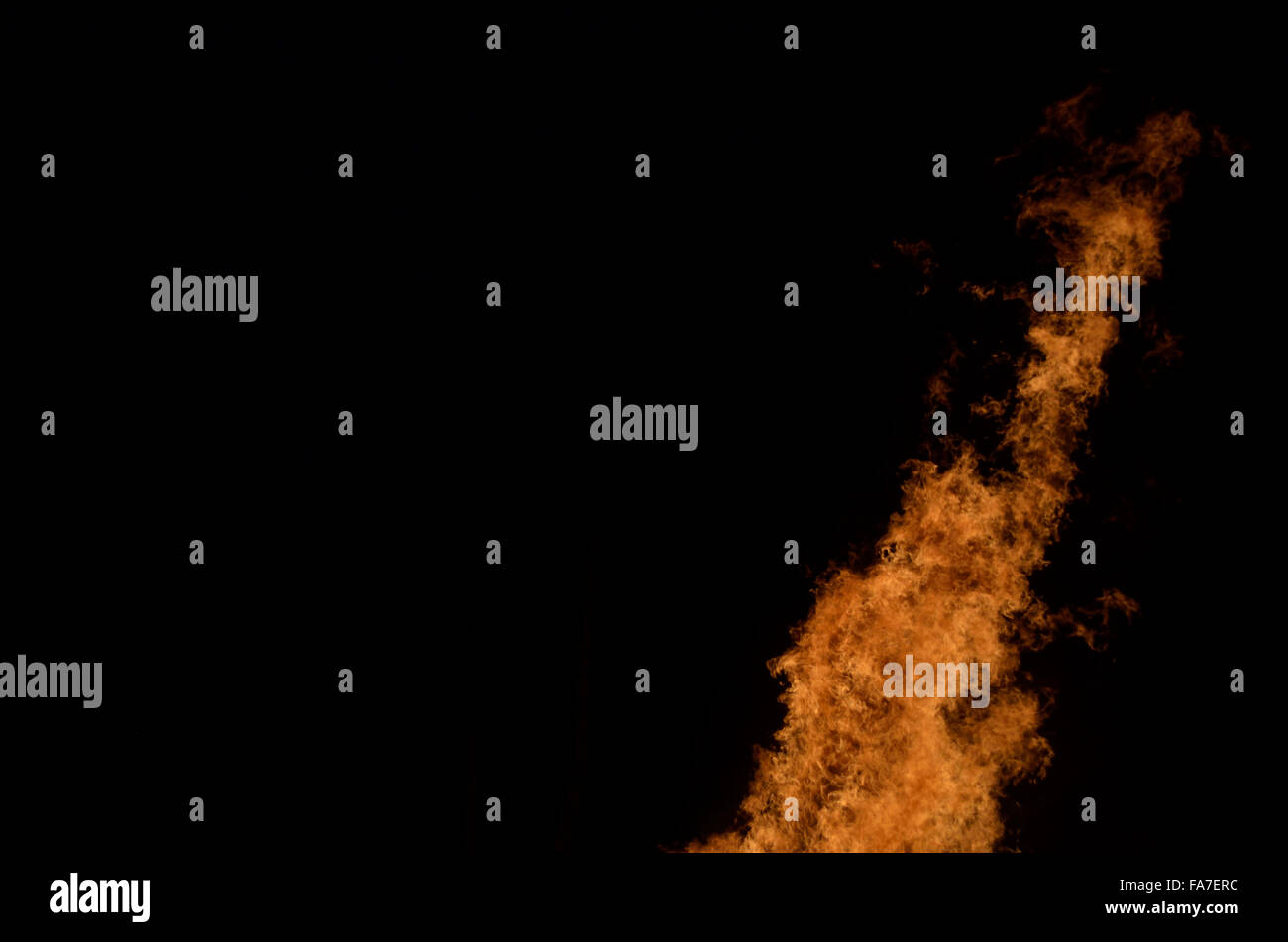 beautiful hot burning tall flames from bonfire on dark winter ...