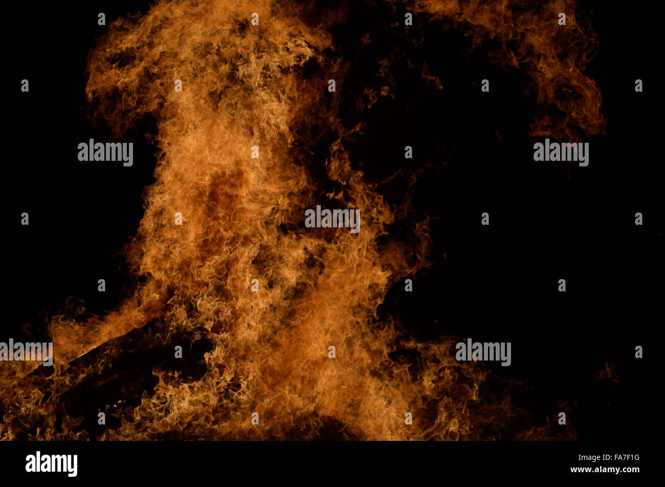 beautiful hot burning tall flames from bonfire on dark winter ...