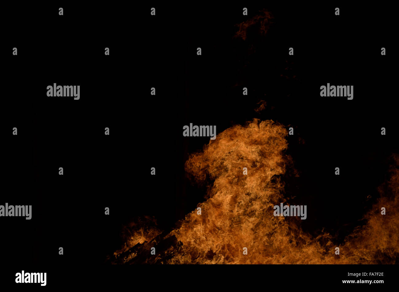 beautiful hot burning tall flames from bonfire on dark winter ...