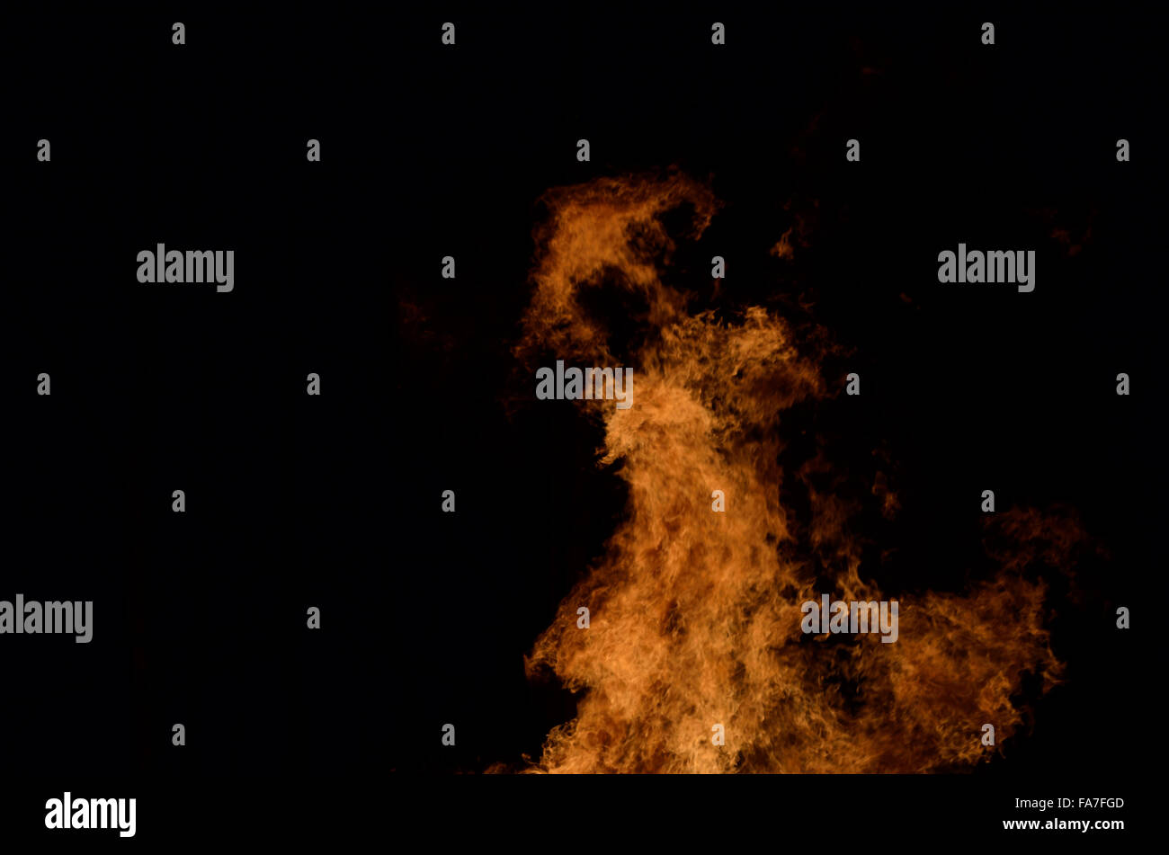 beautiful hot burning tall flames from bonfire on dark winter ...