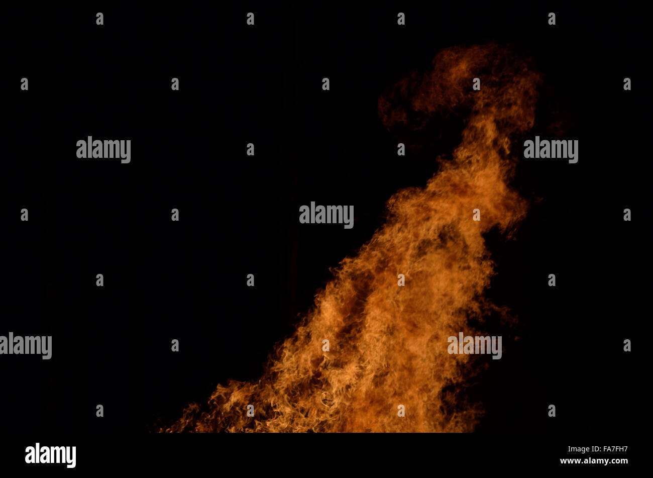 beautiful hot burning tall flames from bonfire on dark winter ...