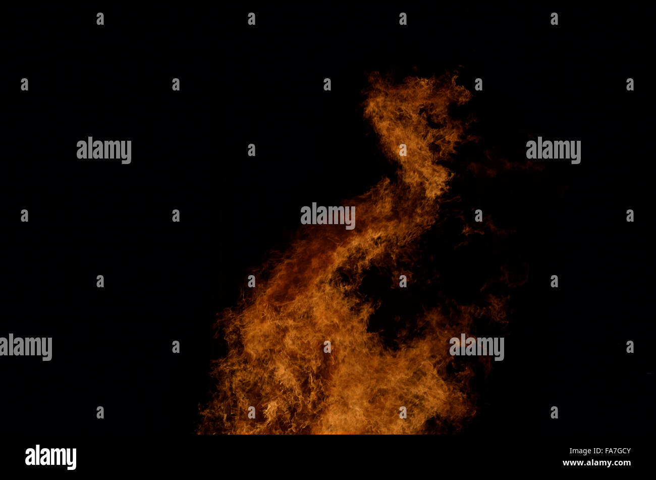 beautiful hot burning tall flames from bonfire on dark winter ...