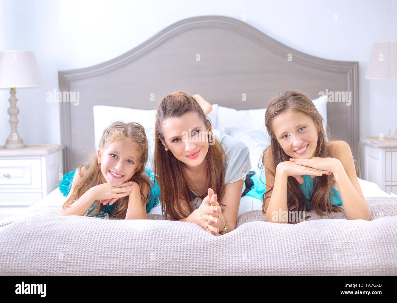 Portrait of a modern happy family Stock Photo - Alamy