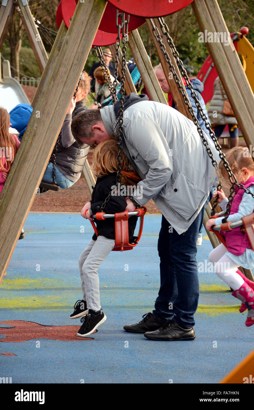 Child father playground hi-res stock photography and images - Alamy